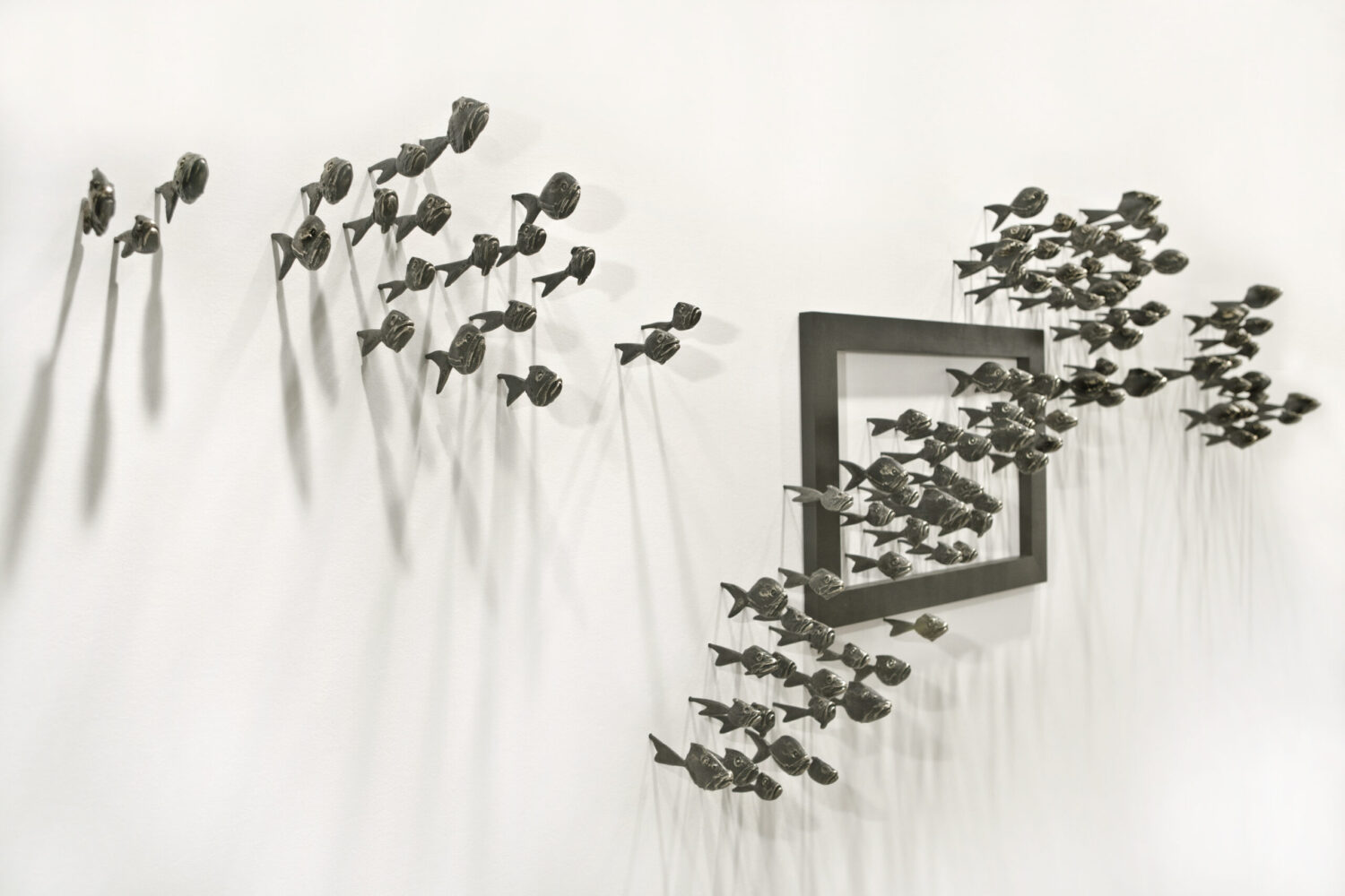 Entrapped Fish 115 pieces - Explosive fish wall installation - MATI ...