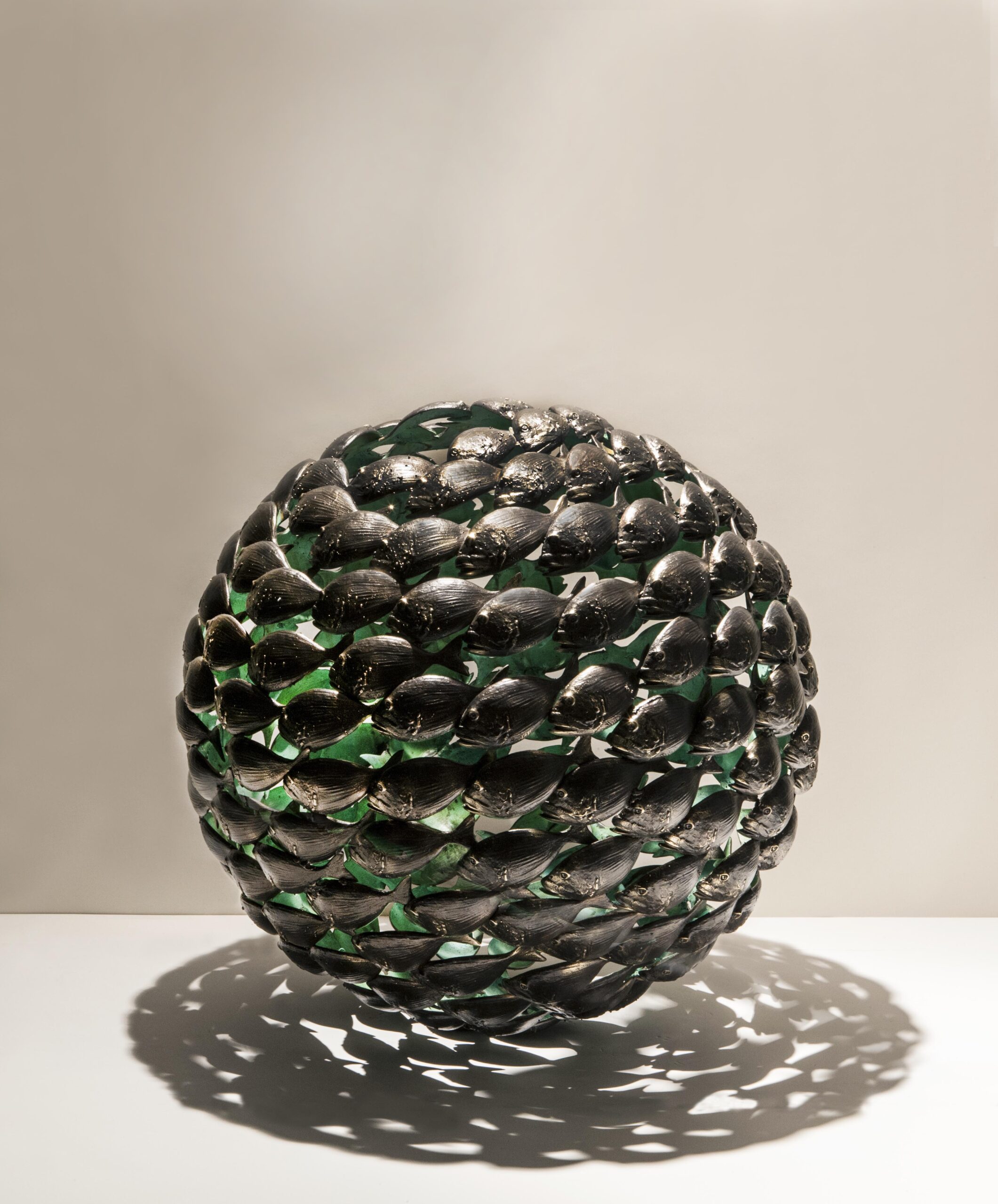 Fishball C5 (FSB) - Bronze sphere sculpture made of a school of fish ...